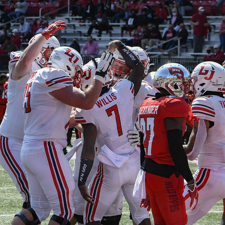 Malik Willis Liberty Career In Photos | A Sea of Red