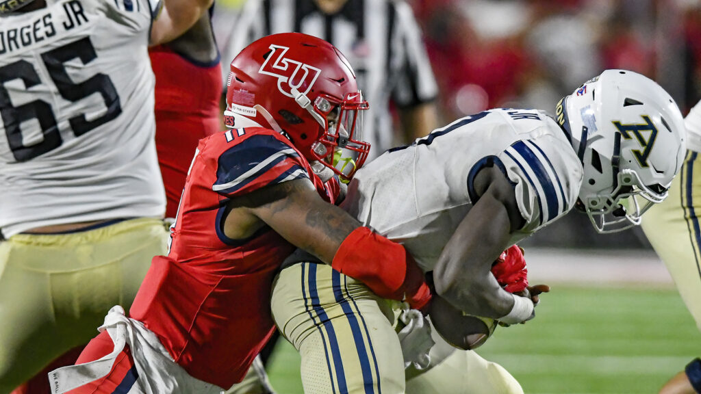 Photo Gallery – Liberty vs Akron | A Sea of Red