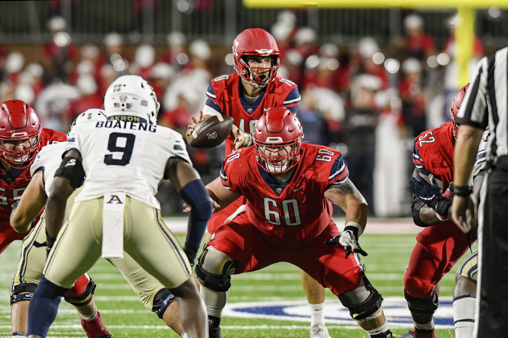 Photo Gallery – Liberty vs Akron | A Sea of Red