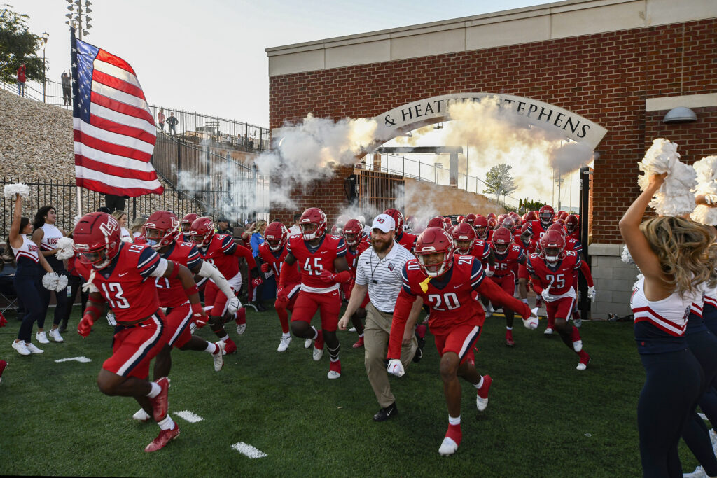 Photo Gallery – Liberty vs Akron | A Sea of Red