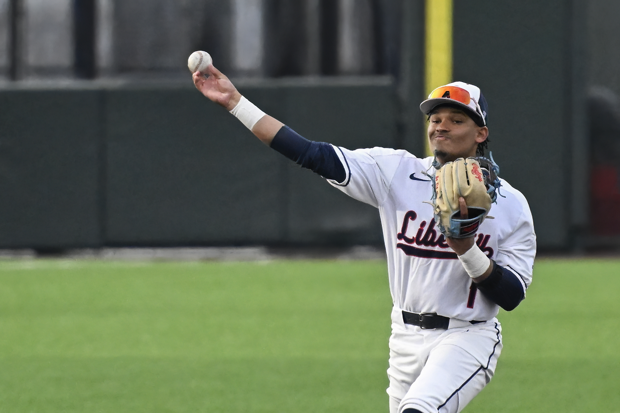 Liberty baseball opens season with series sweep of St John’s | A Sea of Red